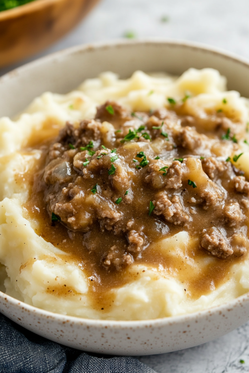 Ground Beef and Gravy Over Mashed Potatoes - That Oven Feelin