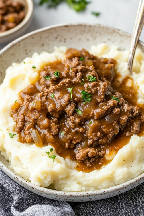 Ground Beef and Gravy Over Mashed Potatoes - That Oven Feelin